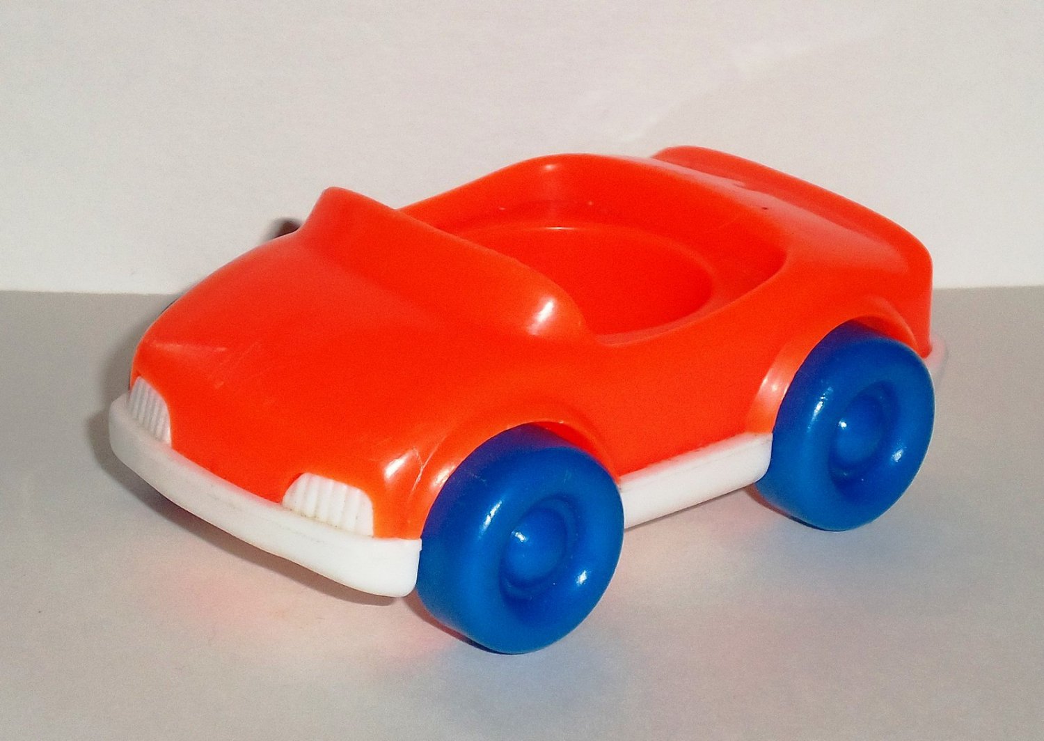 Shelcore 1992 Orange and White Plastic Car Loose Used