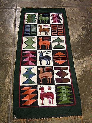 Hand-weaved colorful rug from Peru, green runner with Inca signs
