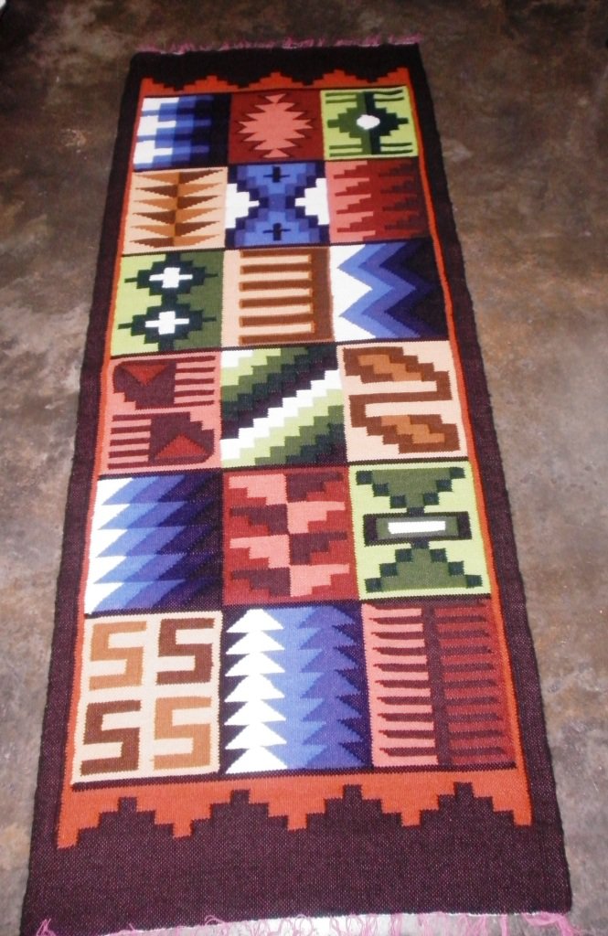 Peruvian hand weaved wool rug with native geometric designs